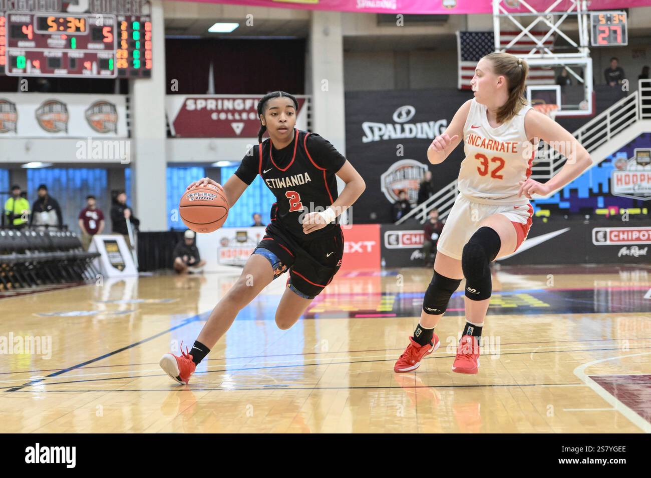 SPRINGFIELD, MA - JANUARY 20: Arynn Finley of Etiwanda (2) drives past Savannah Stricker of ...