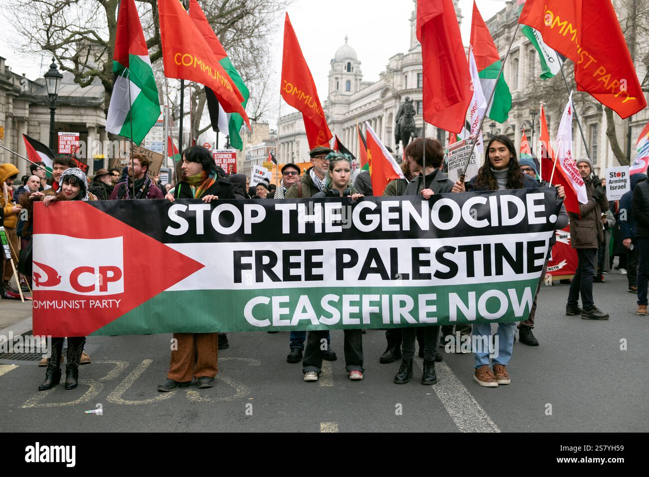 Protesters at Pro Palestine rally hold Stop the genocide Free Palestine ...