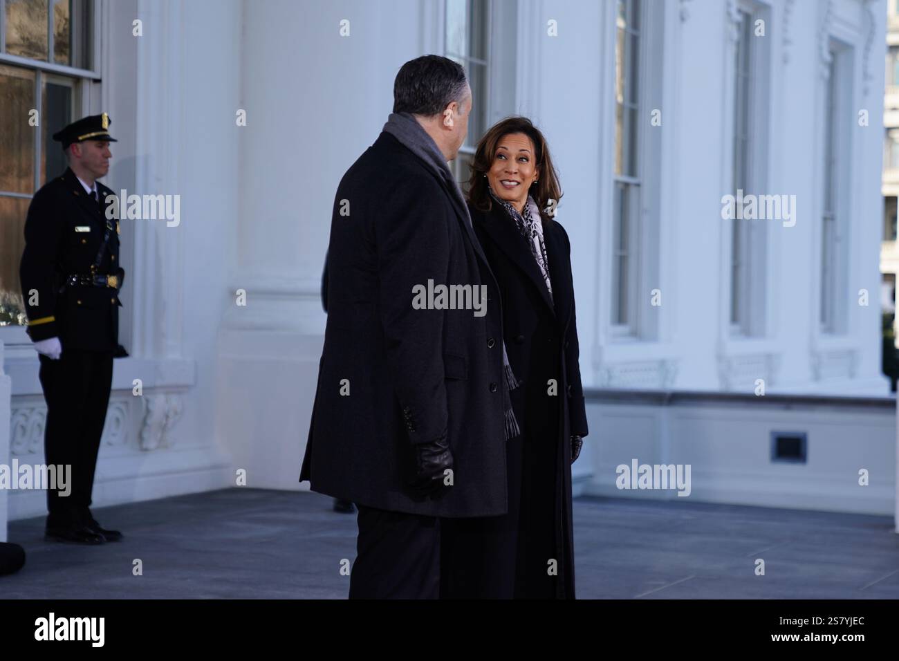Vice President Kamala Harris (R) looks towards Second Gentleman Doug ...