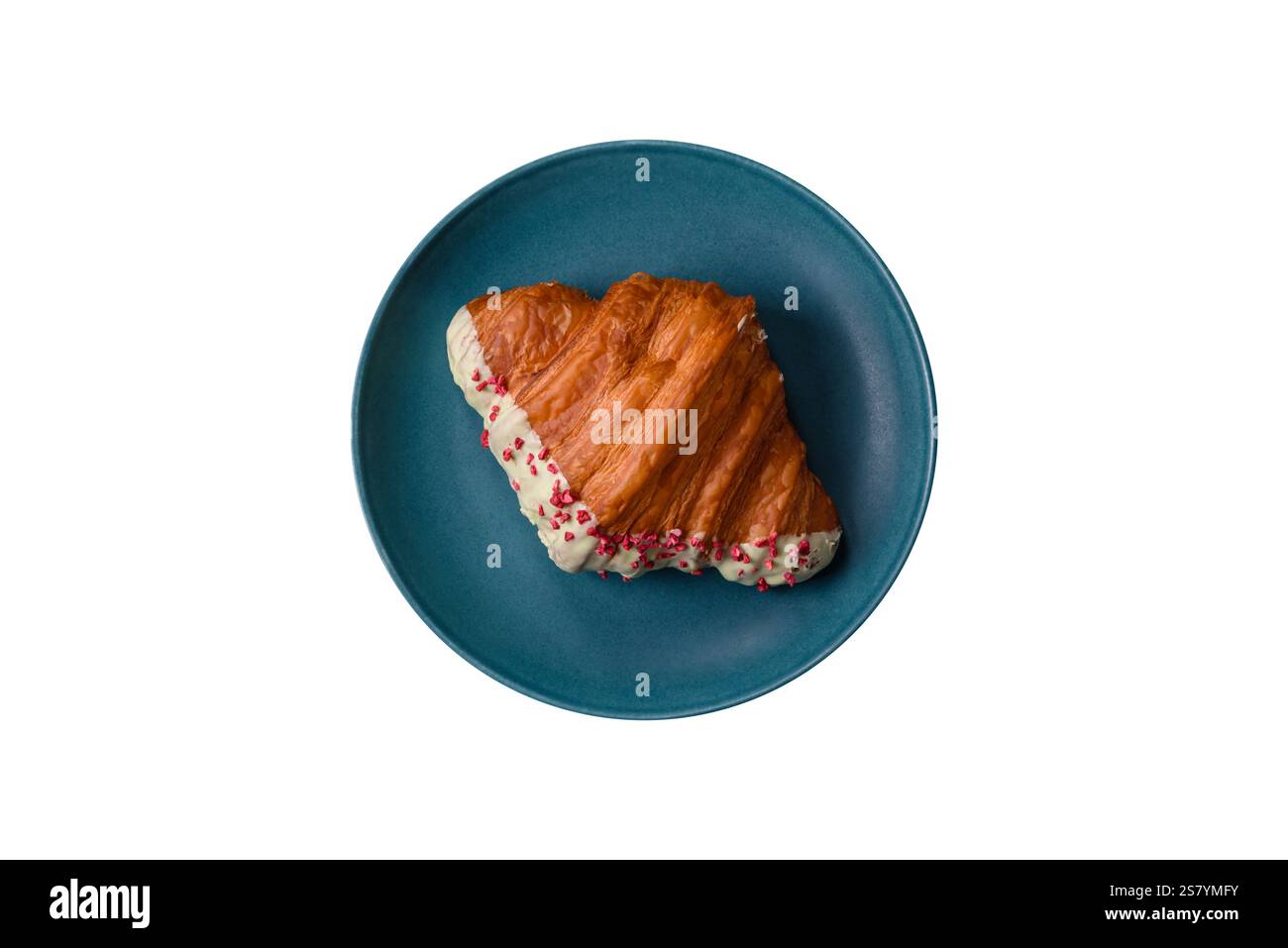 Crispy sweet red croissant with pistachio, raspberry and strawberry on ...