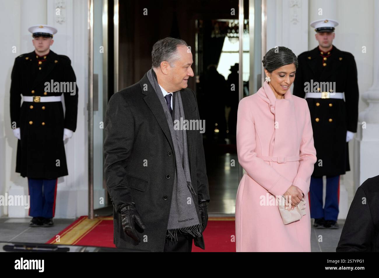 Second gentleman Doug Emhoff and Usha Vance, walk out to move into ...