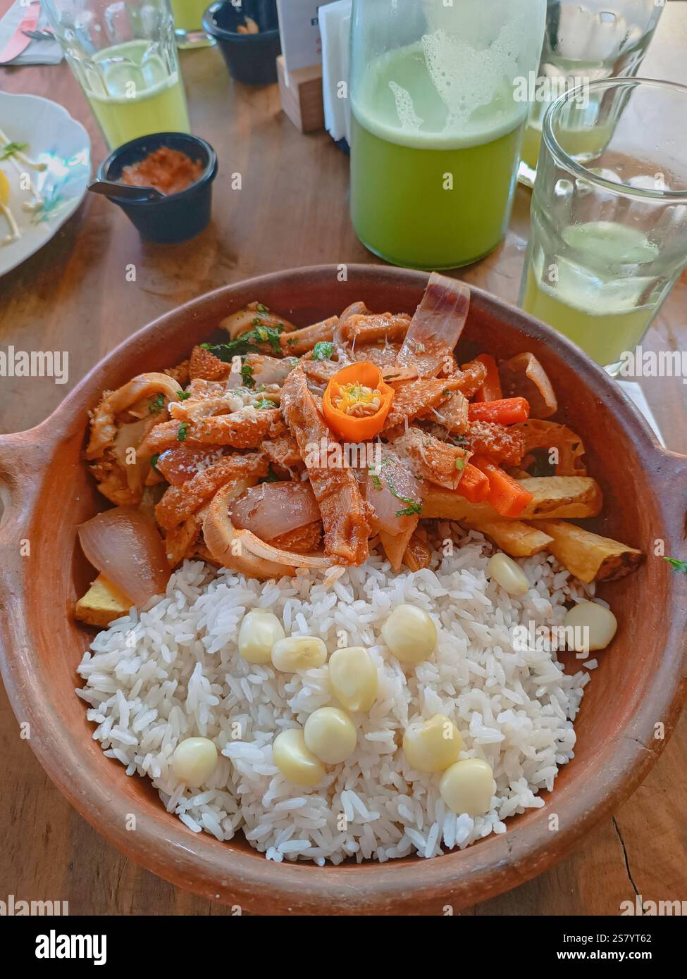 Tripe prepared Italian style seasoned with tomato paste, peas and ...