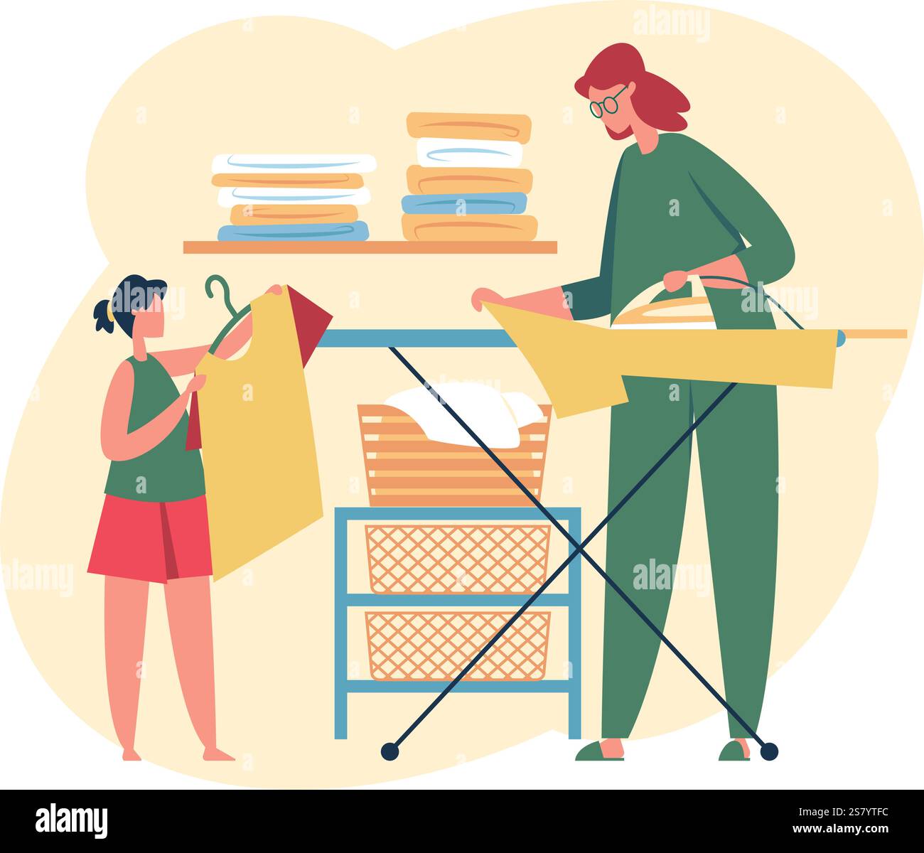 Mother ironing clothes on ironing board and daughter hanging clean ...