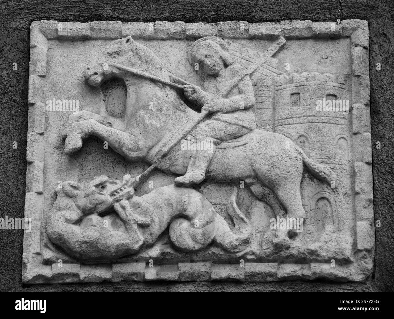 Saint George slaying the dragon. Architectural detail. Bas relief ...