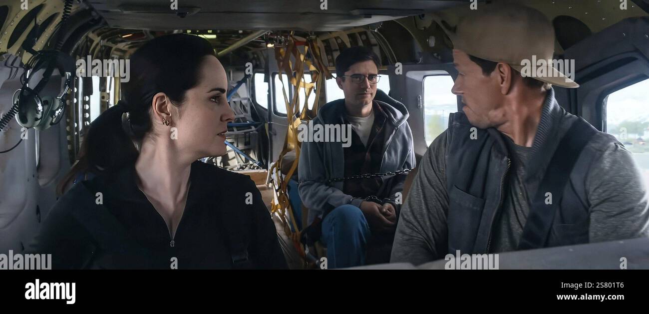 FLIGHT RISK, from left: Michelle Dockery, Topher Grace, Mark Wahlberg, 2025. © Lionsgate Films ...
