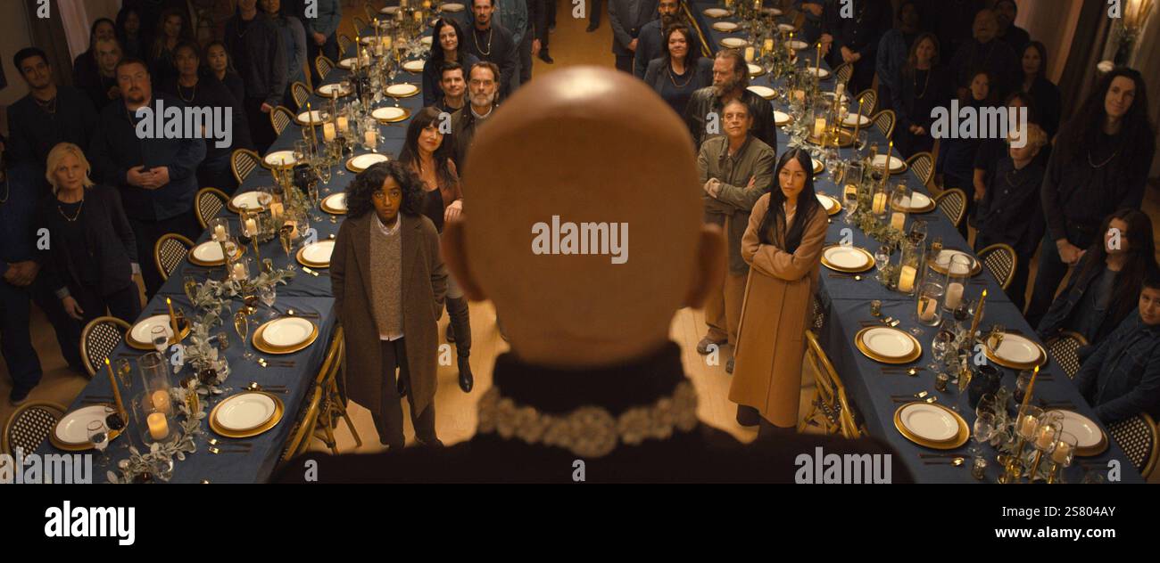 OPUS, Ayo Edebiri (left of center), John Malkovich (center, back to ...