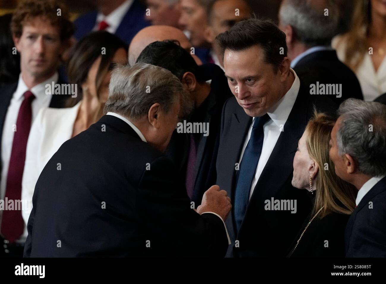 Viktor Knavs talks with Elon Musk before the 60th Presidential ...