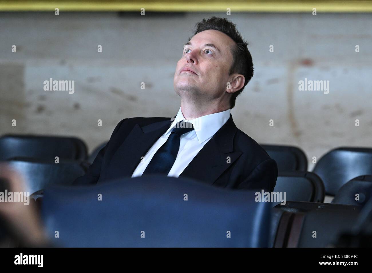 Tesla and SpaceX CEO Elon Musk takes his seat at the inauguration ...