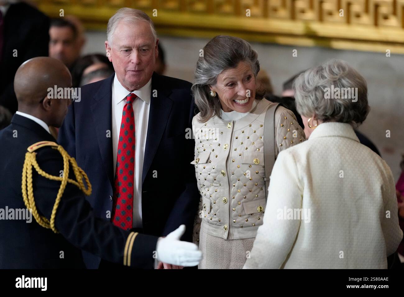 Former Vice President Dan Quayle and his wife Marilyn greet Susie Wiles ...
