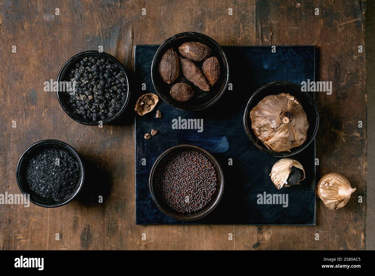 Set of five black spices: black fermented garlic, black Himalayan salt ...