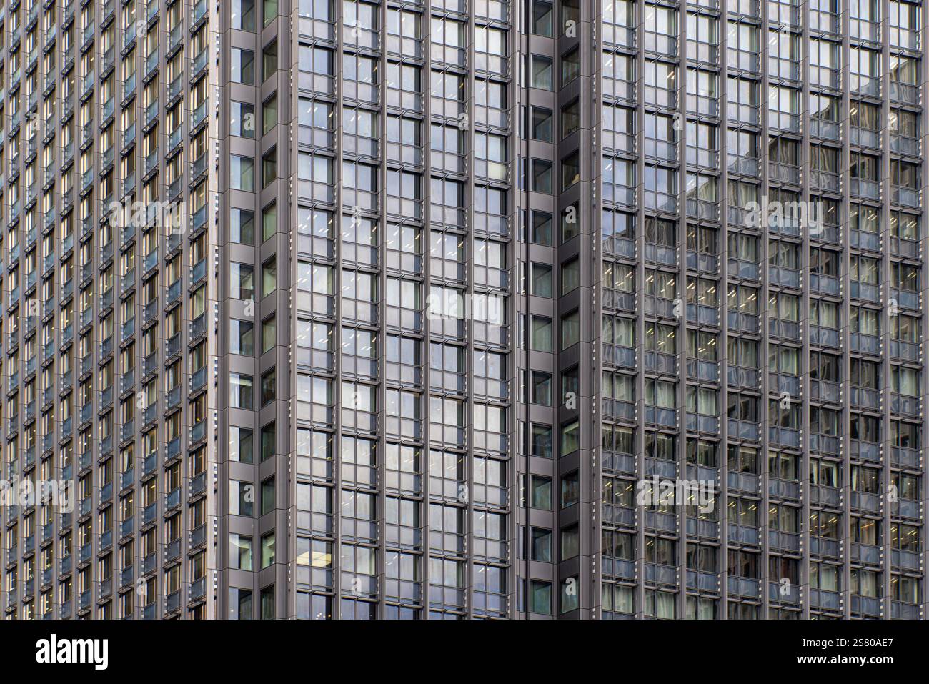 Modern office buildings showing repeating glass windows Stock Photo - Alamy