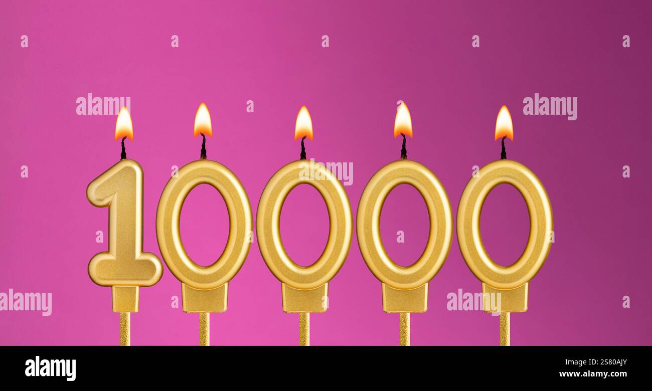 Candles form the number 10000 - Number of followers Stock Photo - Alamy