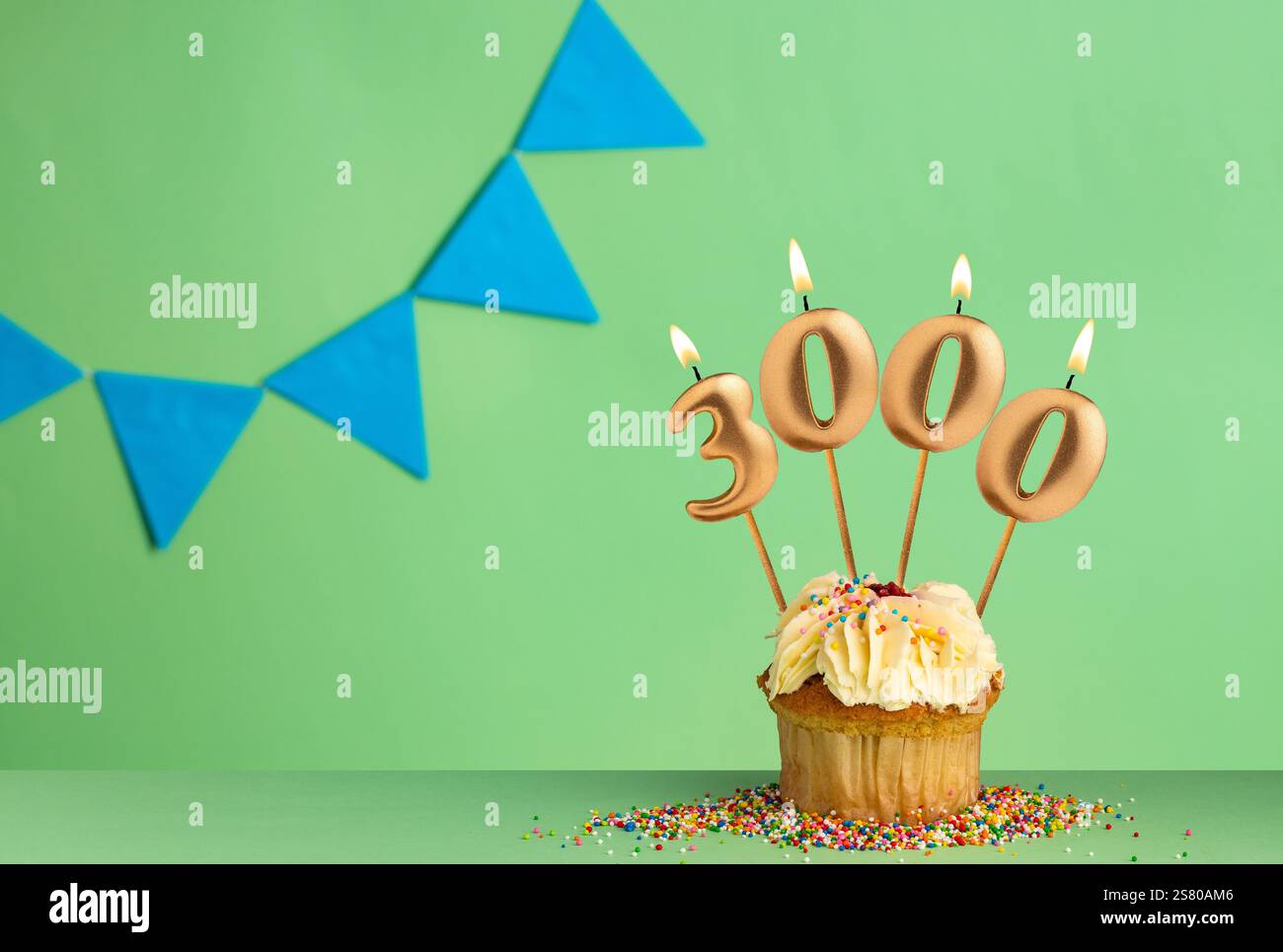 Candles forming the number 3000 - Green background Stock Photo - Alamy