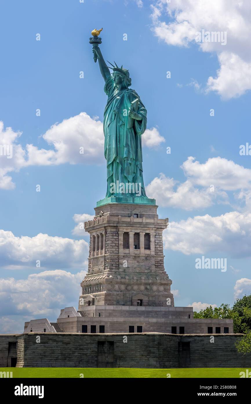 The statue of Liberty under a blue sky on a summr day Stock Photo - Alamy