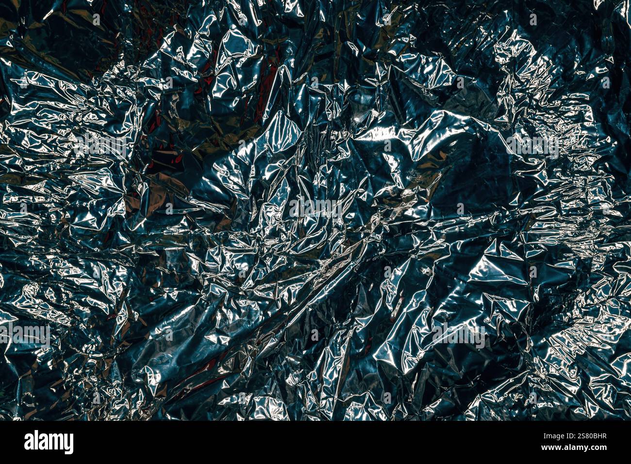 Texture of crumpled aluminum foil sheet as background, top view Stock ...