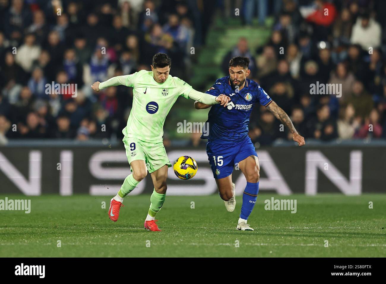 Getafe, Spain. 18th Jan, 2025. (L-R) Robert Lewandowski (Barcelona ...