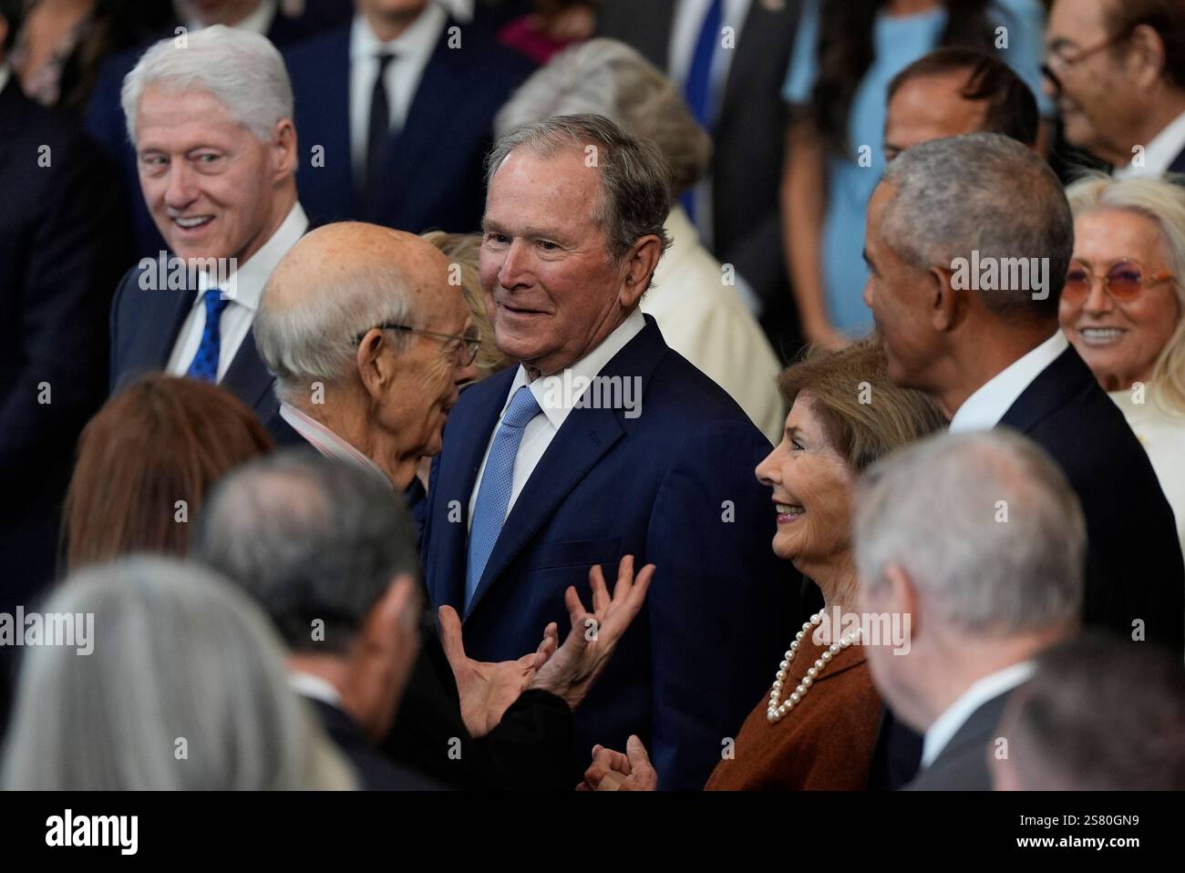 Retired Supreme Court Justice Stephen Breyer talks with Laura Bush as ...
