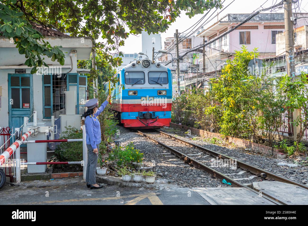 Lady crossing railway line hi-res stock photography and images - Alamy