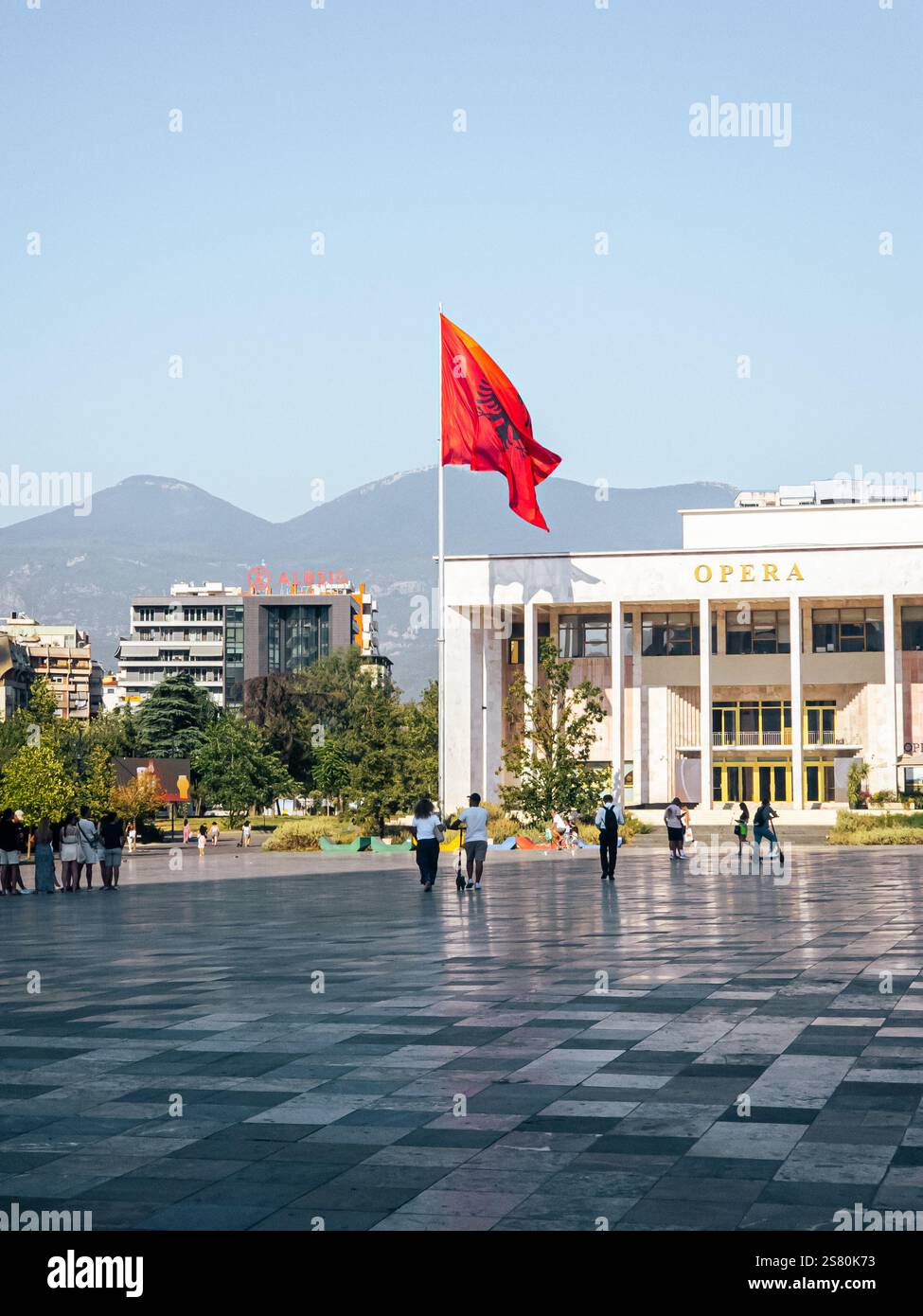 Vibrant scene at Skanderbeg Square in Tirana, Albania, with the ...