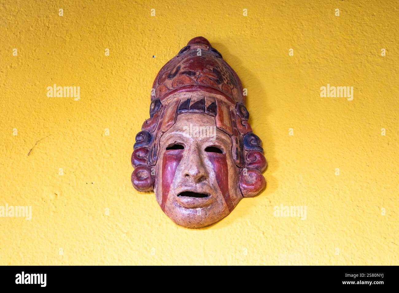 Colorfully painted traditional Mayan terracotta face mask. Antiqua ...
