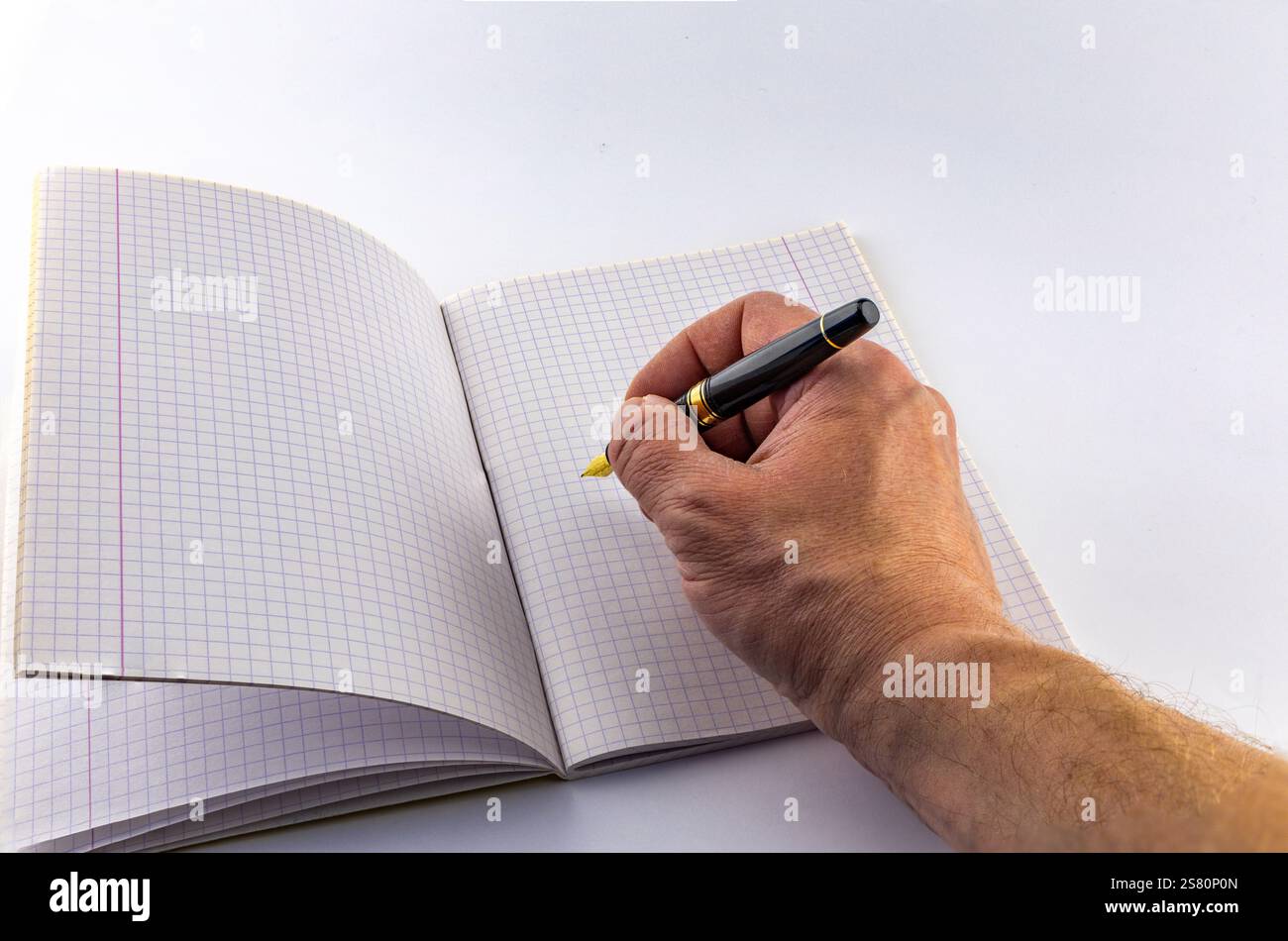 International ink pen writing day, pen on white background in man's ...