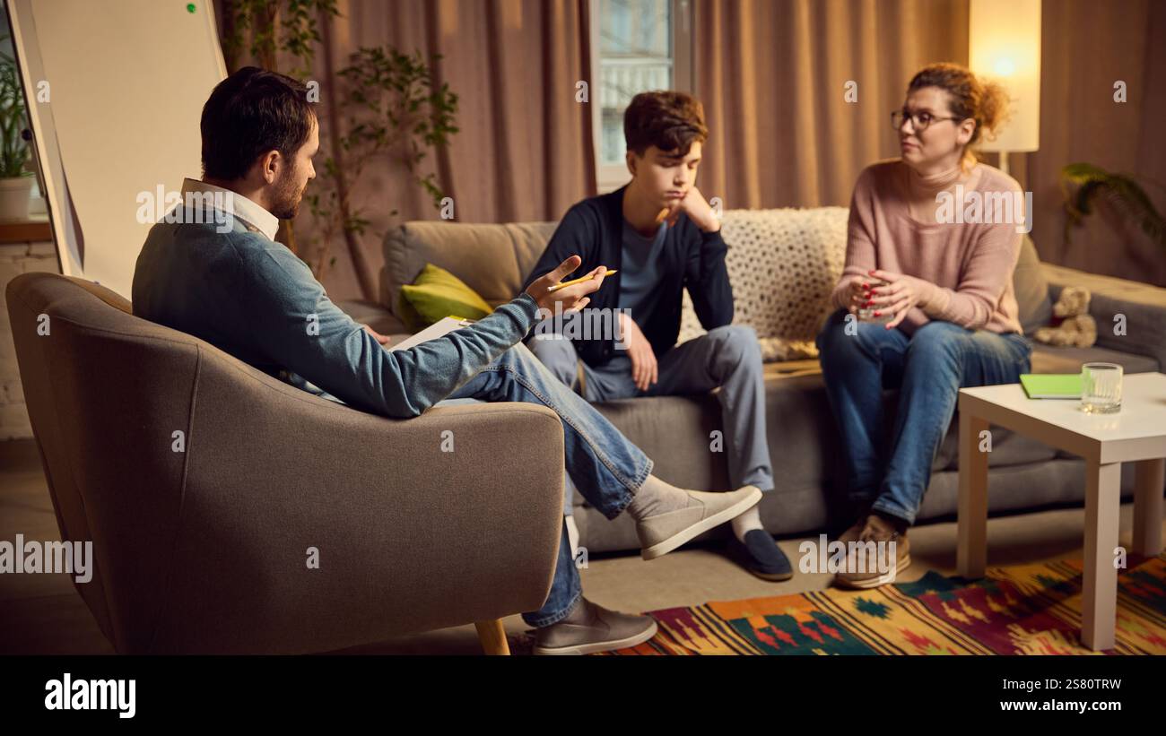 Man, psychologist talks with mother and her teenage son, discuss family ...
