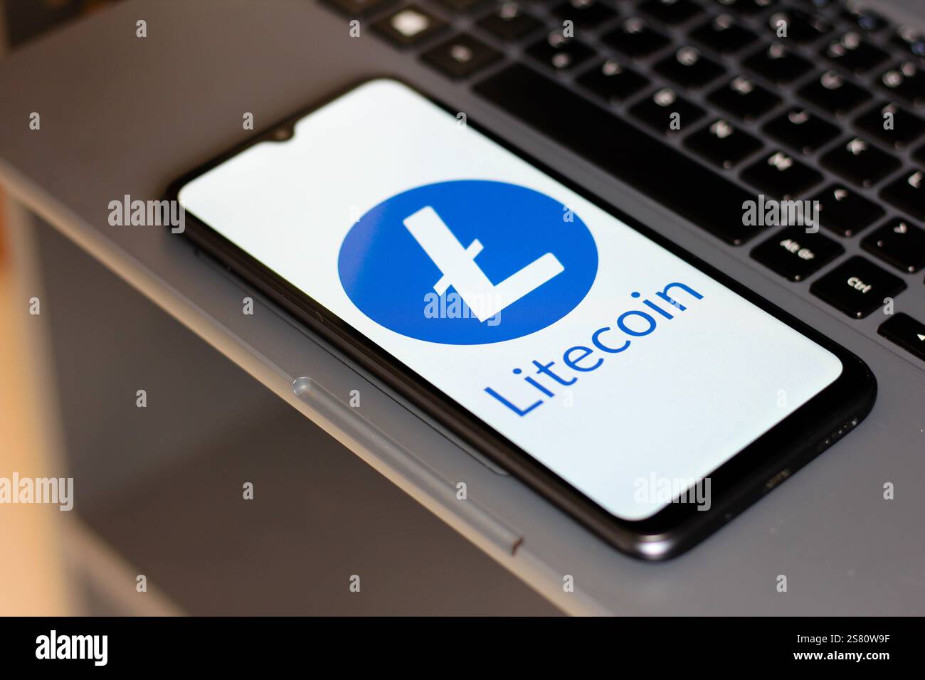 In this photo illustration, the Litecoin logo is seen displayed on a ...