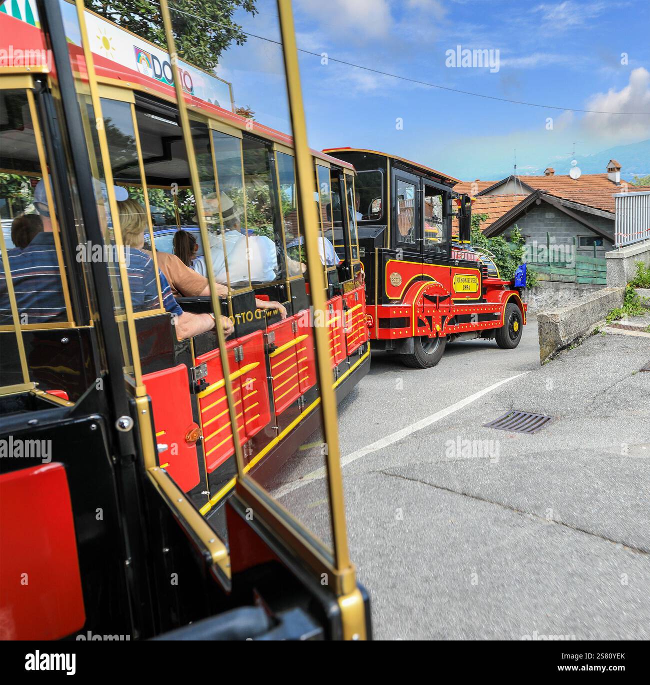 A "Dotto" toy train on the streets of Stresa, Lake Maggiore, Italy ...