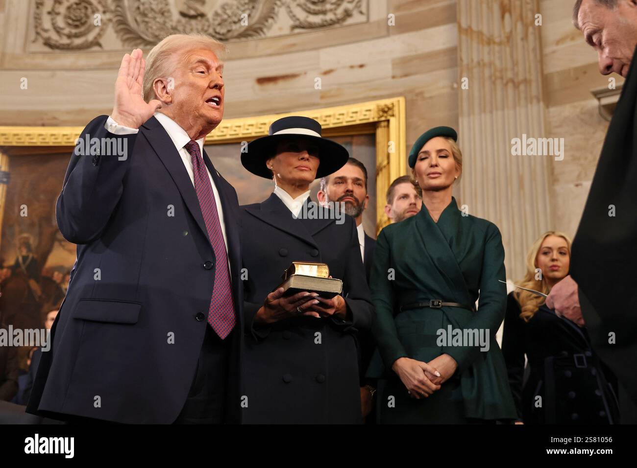 President-elect Donald Trump takes the oath of office as he is sworn in ...