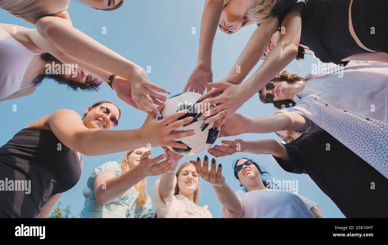 High school students coming together in unity and teamwork, forming a ...