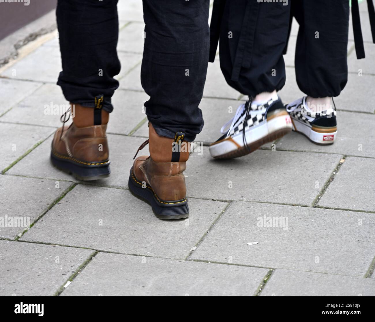 Feet walking, going away Stock Photo - Alamy