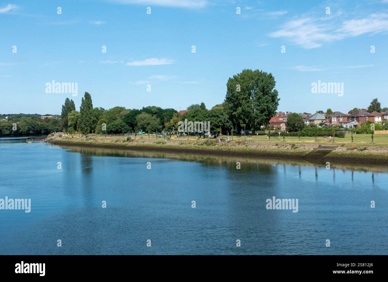 Families enjoy peaceful walk along hi-res stock photography and images ...
