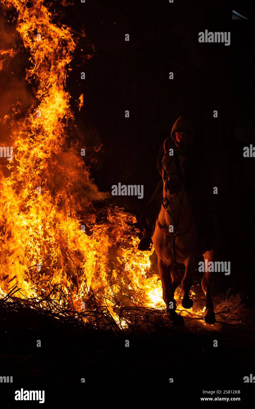16 January 2025, Knights cross bonfires with their horses in an ancient ...