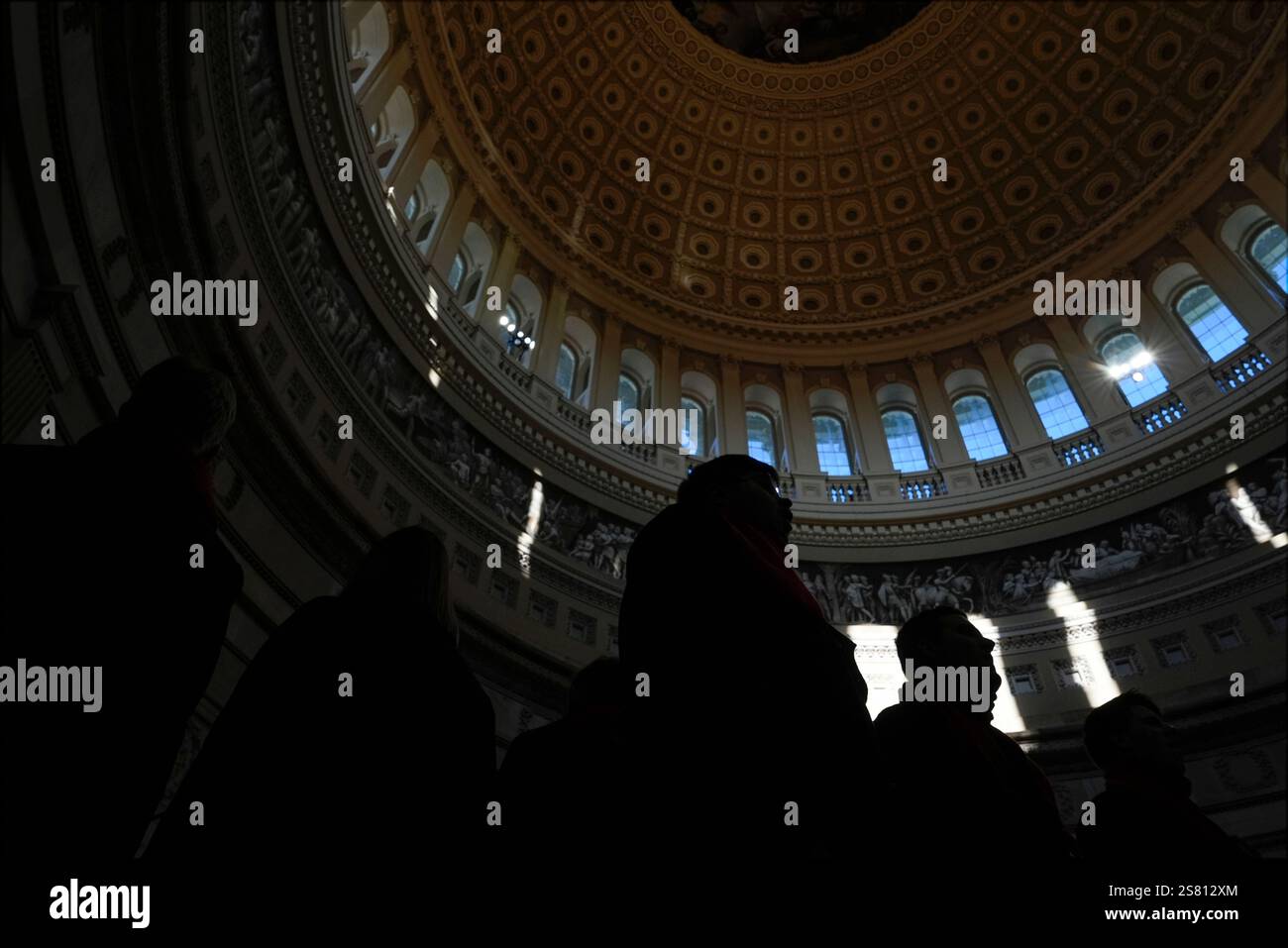 People arrive before the 60th Presidential Inauguration in the Rotunda ...