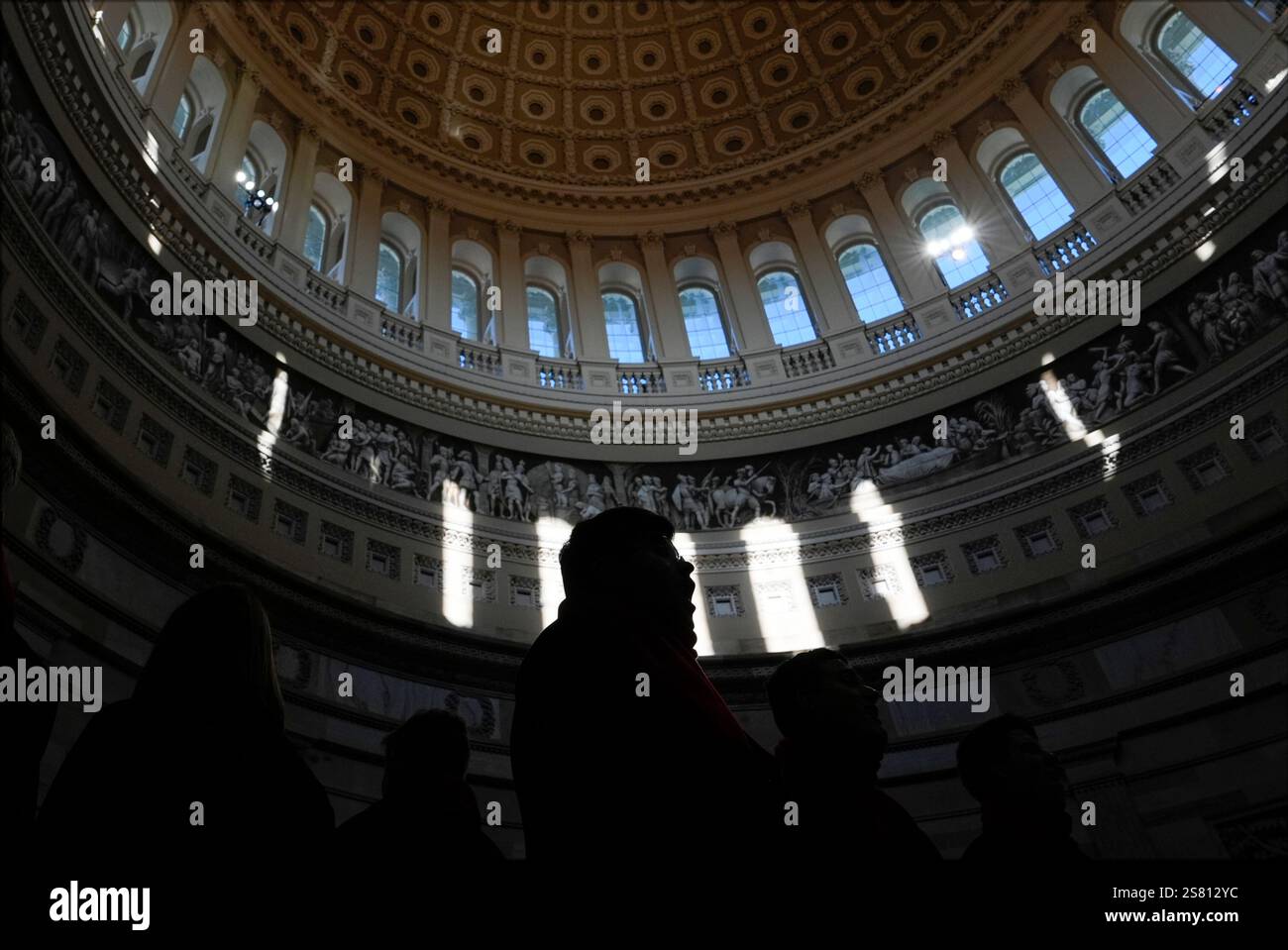 People arrive before the 60th Presidential Inauguration in the Rotunda ...