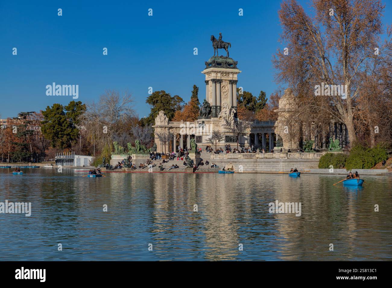 Madrid, Spain - December 21, 2024: People enjoying a boat ride on the ...