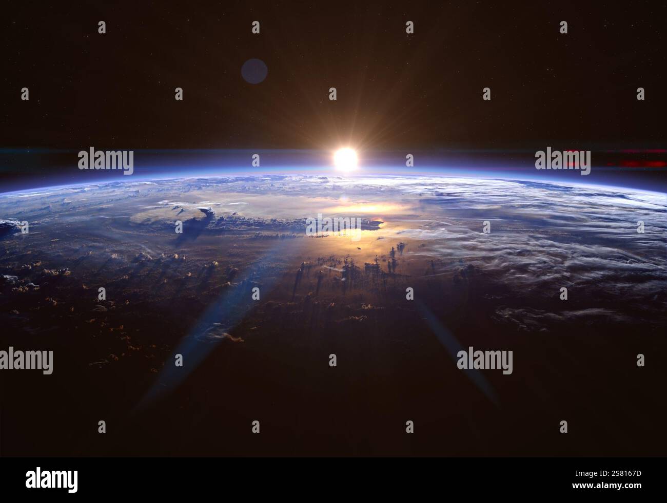 Sunrise over planet Earth, view from space. The Sun rises on the ...
