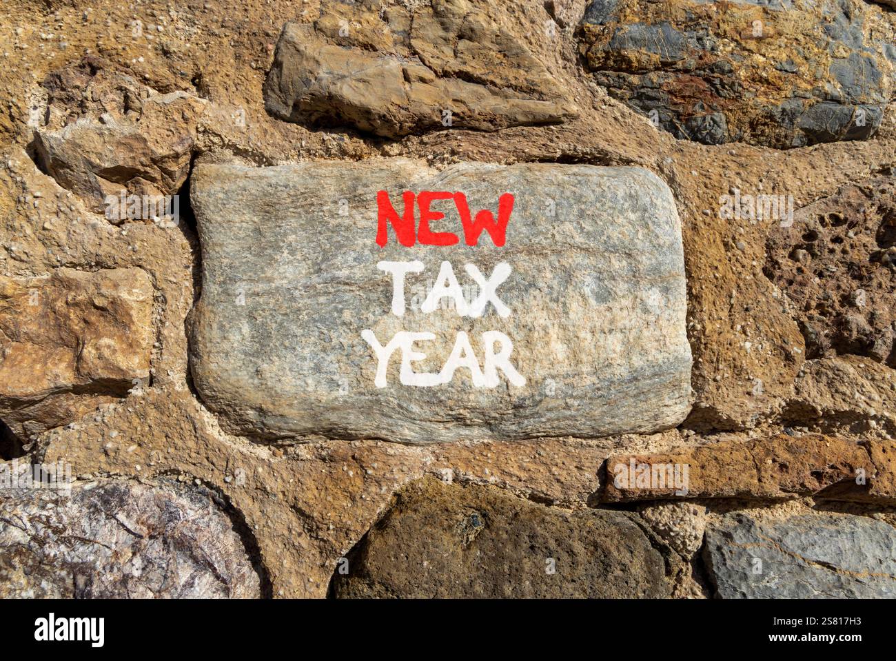 New tax year symbol. Concept words New tax year on beautiful grey stone ...