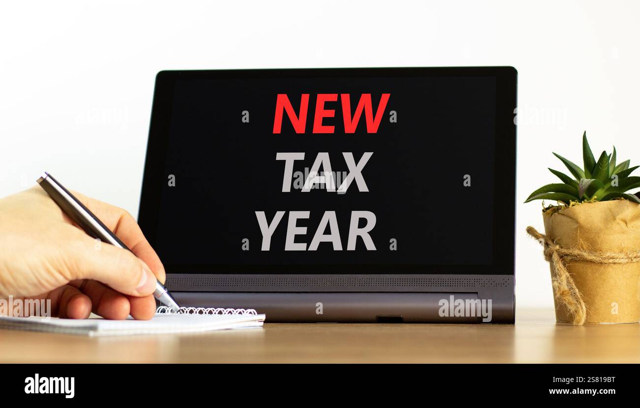 New tax year symbol. Concept words New tax year on beautiful black ...