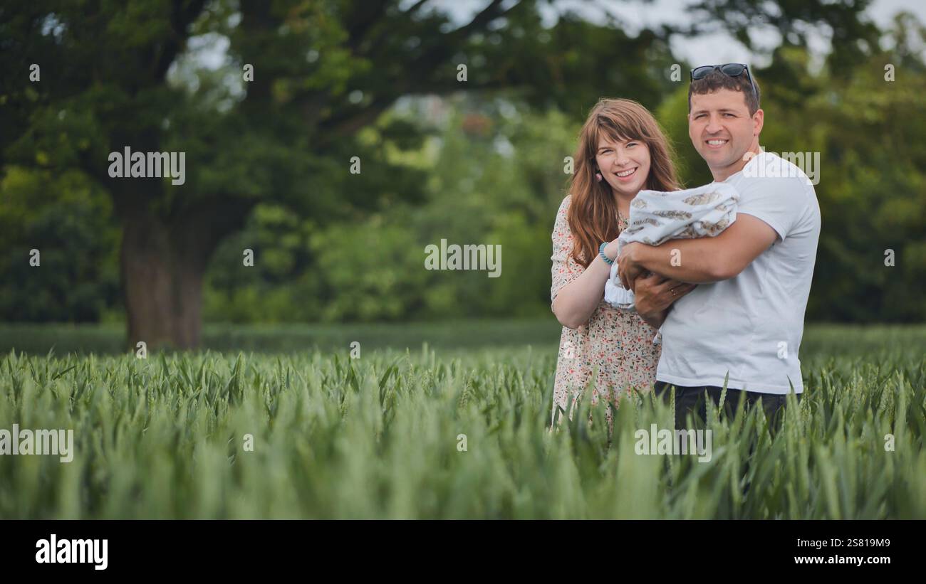 Family bonding outdoors, sharing laughter and love, embracing new life ...