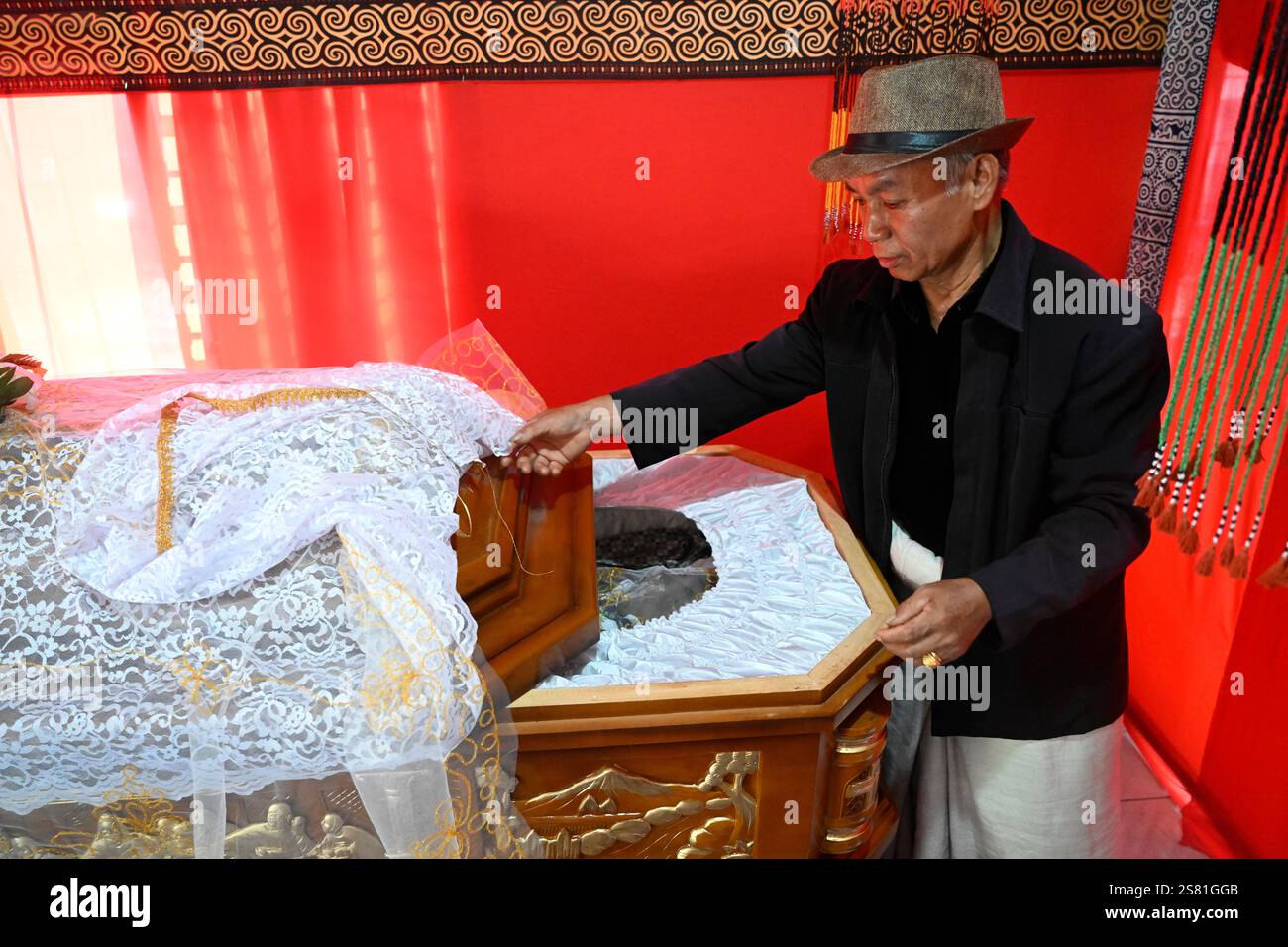 The 15 month dead body inside the coffin visited by her relatives for a ...