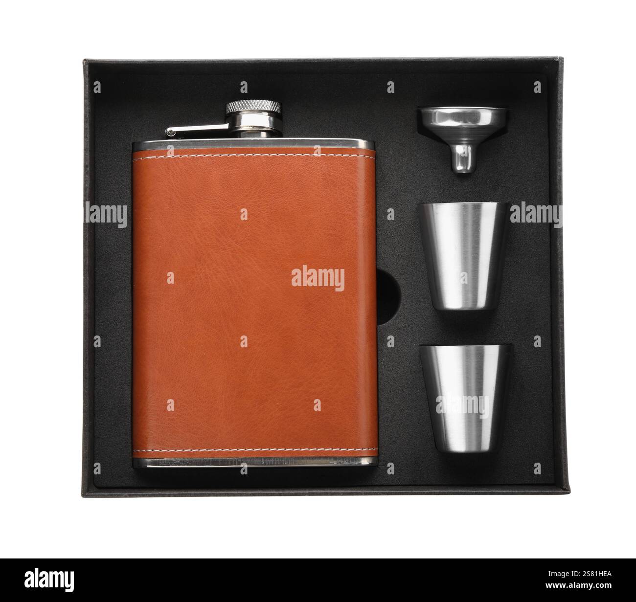 Hip flask, cups and funnel in package isolated on white, top view Stock ...