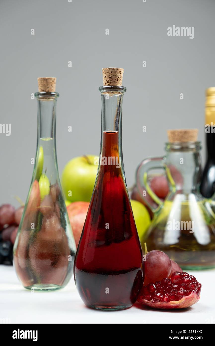 Different types of vinegars in vinegar bowls against the background of ...