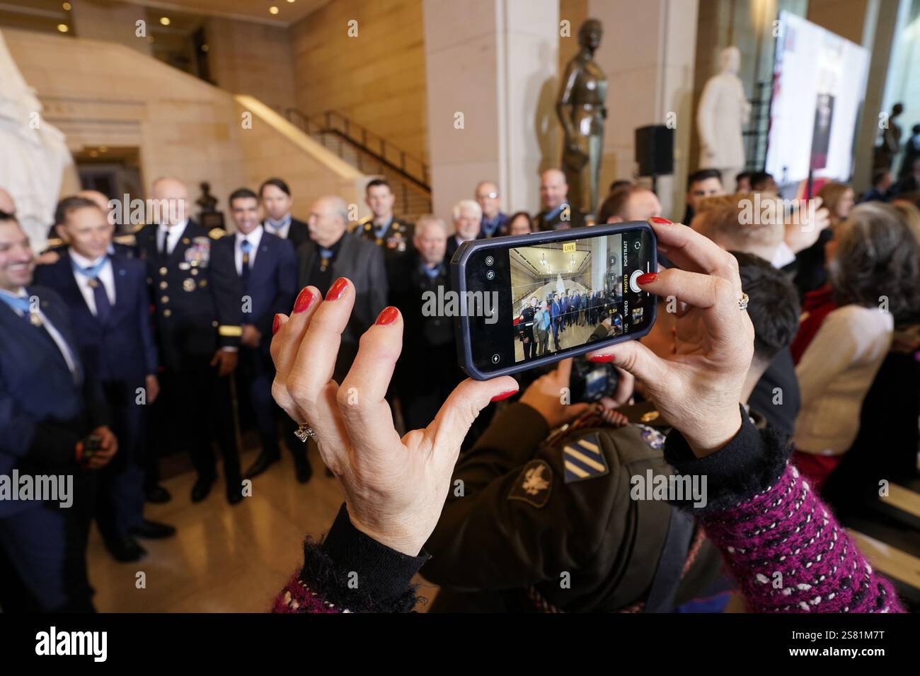 is seen in an overflow room for President-elect Donald Trump's ...