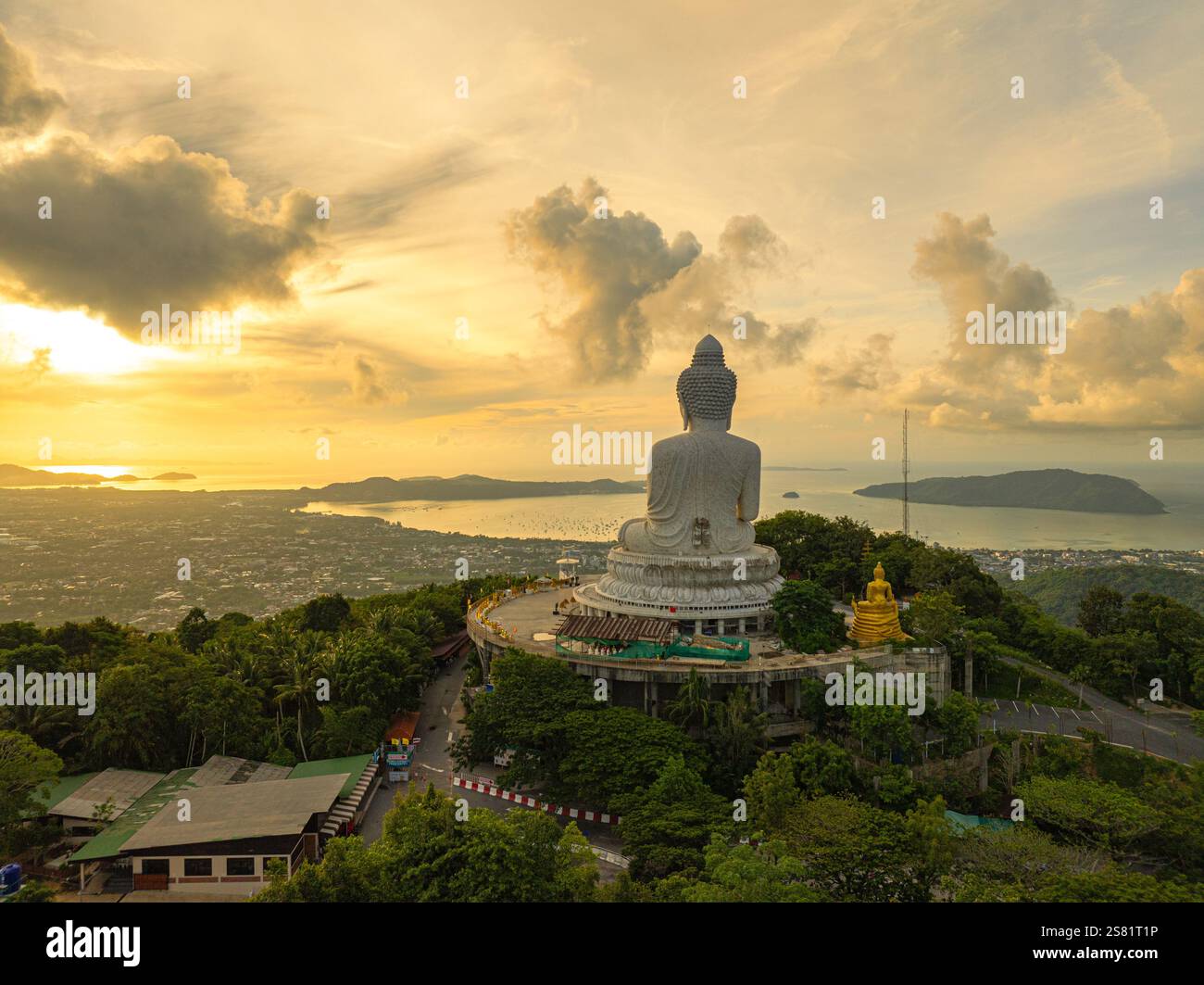 Aerial view flare of sunlight shines through the clouds above the ocean ...