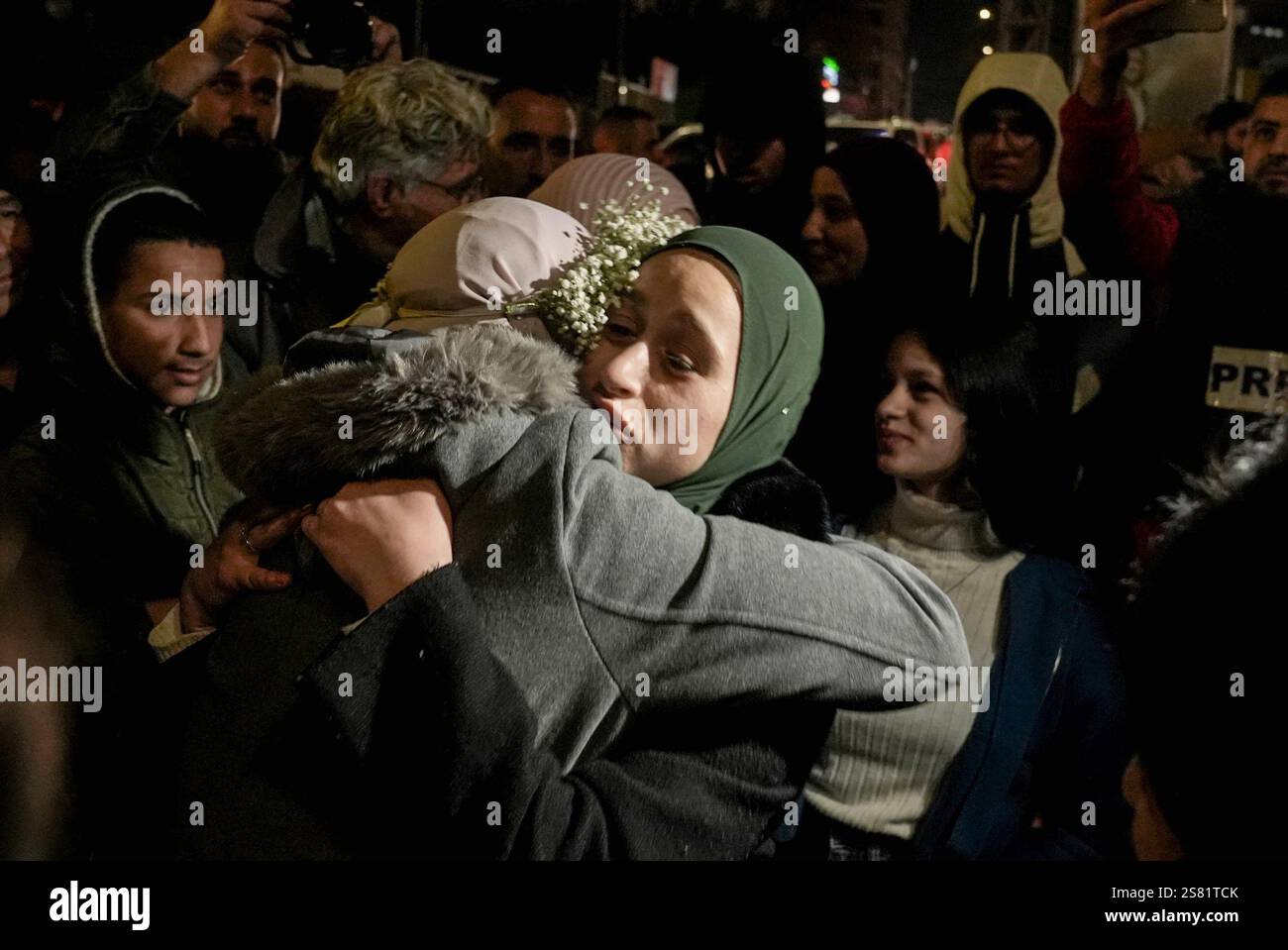 Beitunia, West Bank. 20th Jan, 2025. Palestinian prisoner (L), is ...
