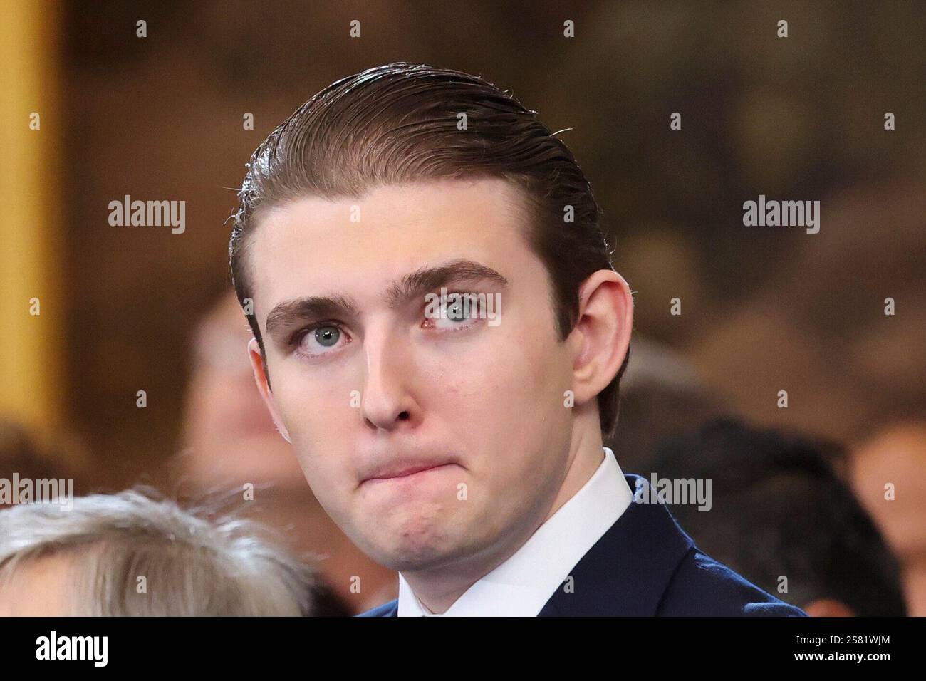Barron Trump looks on ahead of the Presidential Inauguration of Donald ...