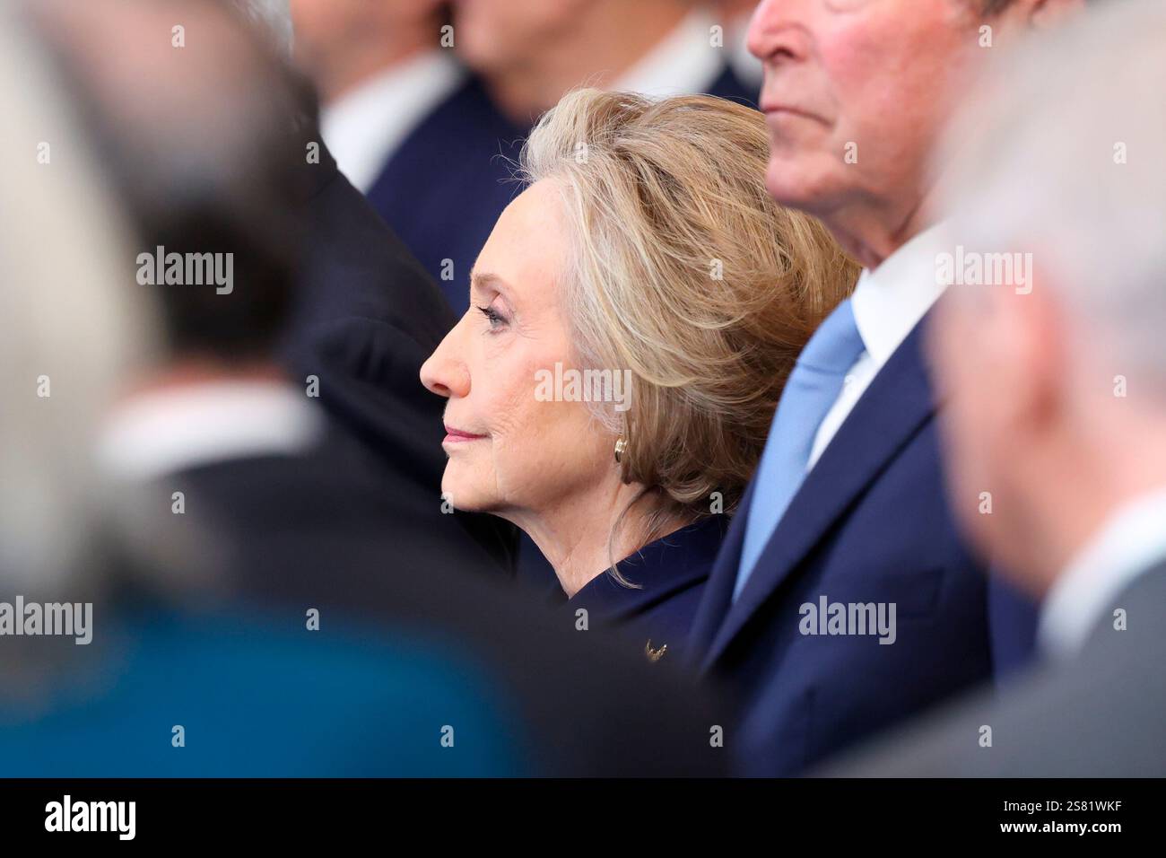 Former Secretary of State Hillary Clinton looks on ahead of the ...