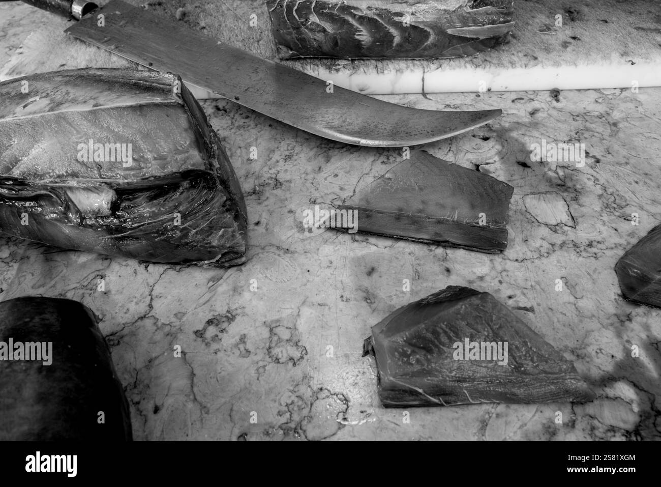 Fish on slab with large knife at the fish market, Funchal, Madeira ...