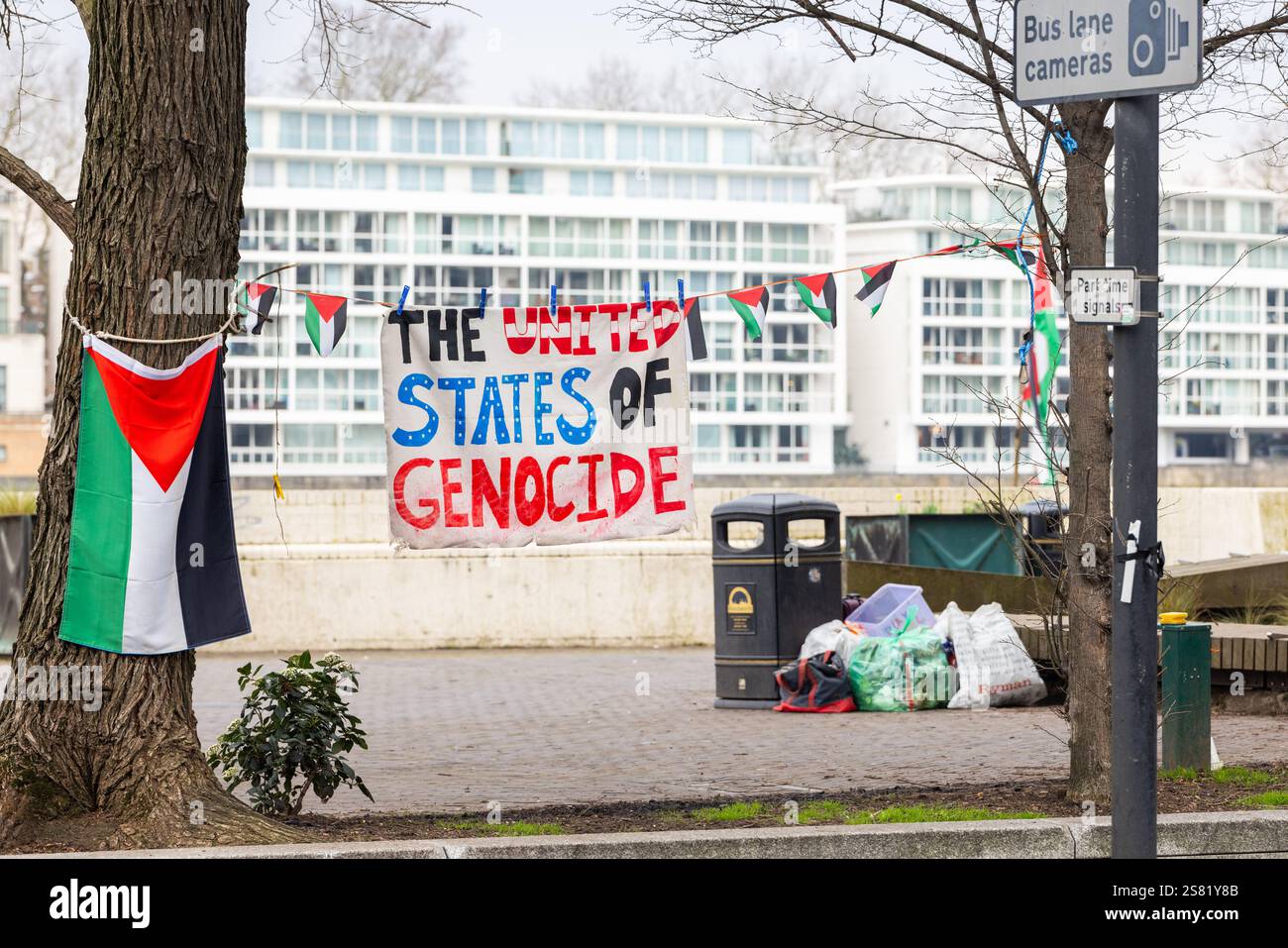 London, UK. 20 JAN, 2025. "The united states of Genocide" sign hangs ...